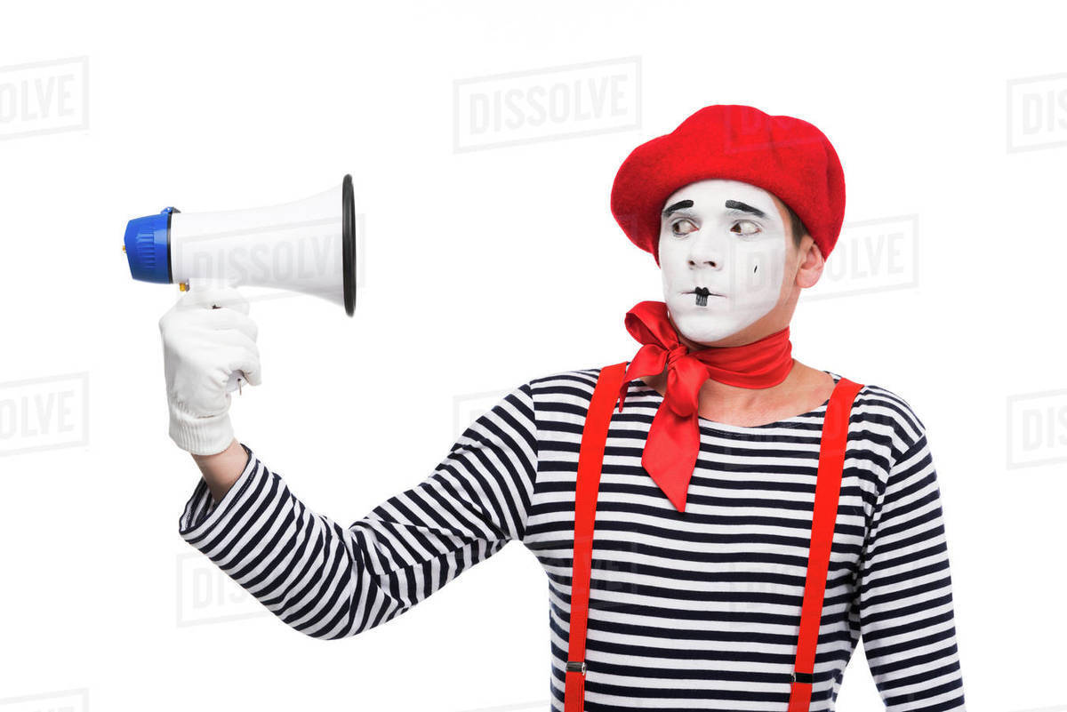 Scared mime looking at megaphone isolated on white - Royalty-free Stock ...