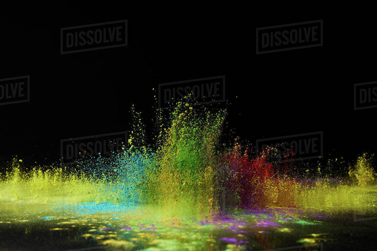 Colorful holi powder explosion on black, Hindu spring festival ...
