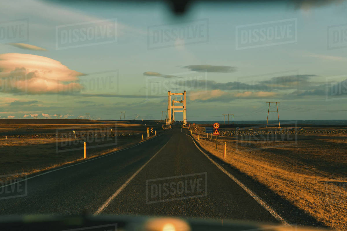 Pov from car on asphalt road at sunset in Iceland - Royalty-free Stock ...