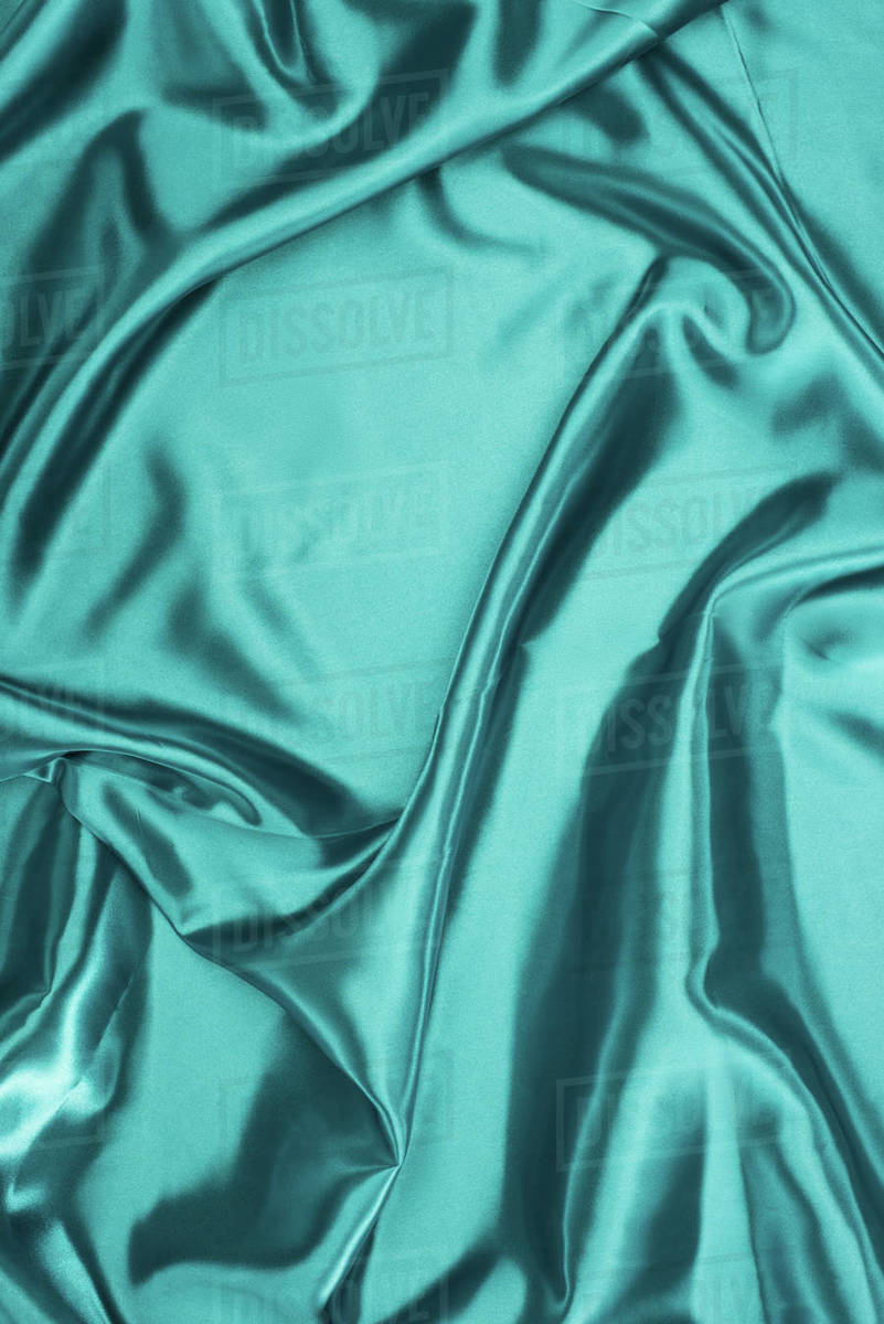 Turquoise shiny wavy satin fabric background - Royalty-free Stock Photo ...