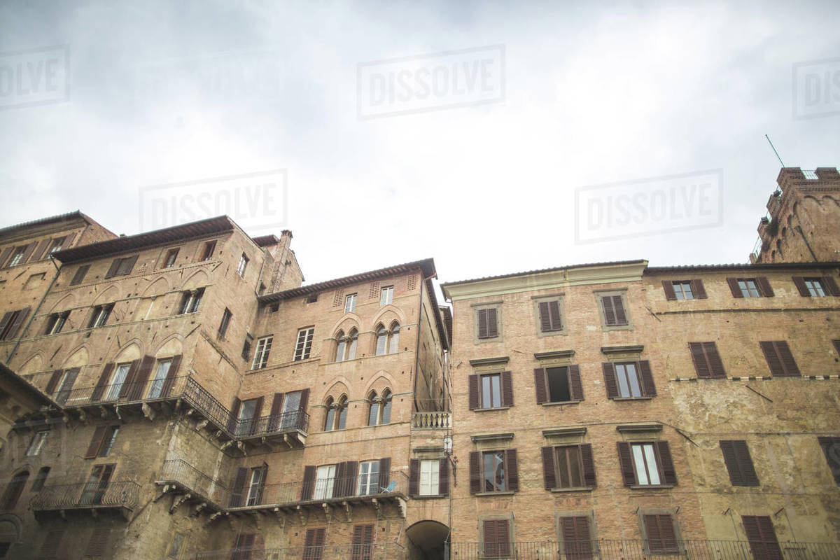 Tuscany architectural buildings on street in sienna - Stock Photo ...