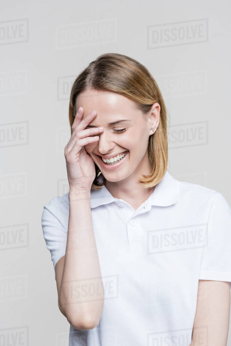 Portrait of beautiful shy woman, isolated on grey - Royalty-free Stock ...