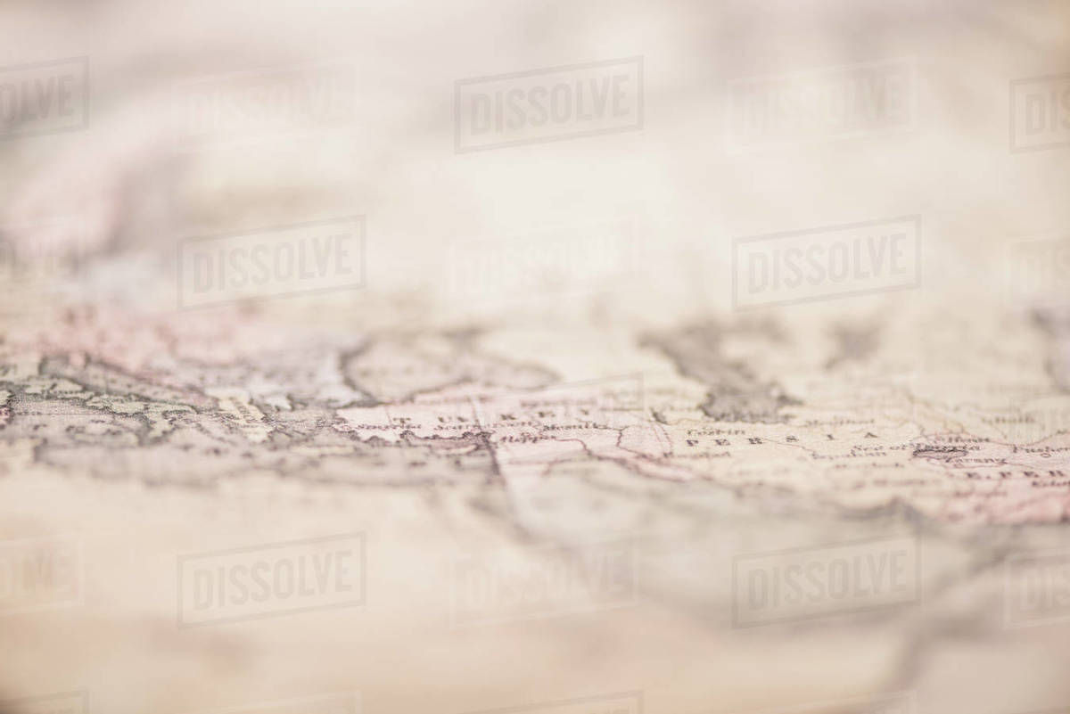 close-up shot of vintage world map, travel concept - Stock Photo - Dissolve
