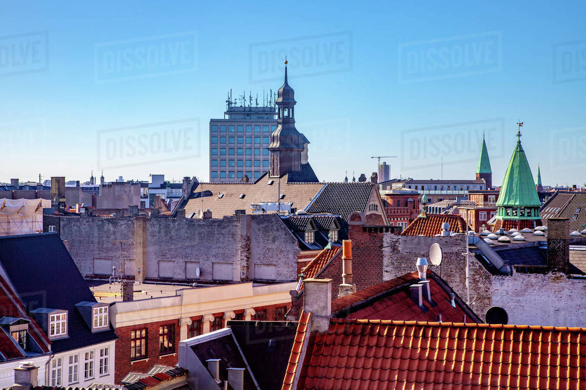 Aerial view of rooftops, church and skyscraper in copenhagen, denmark ...
