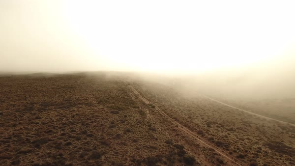The desert with fog. - 4K Rights-managed Stock Video Footage | Dissolve