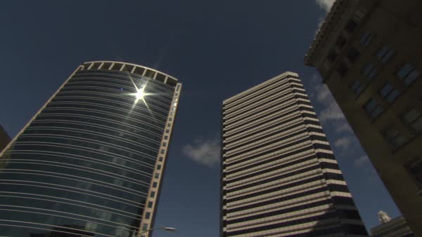 Panning shot looking up at tall high rise buildings in Oakland. - HD ...