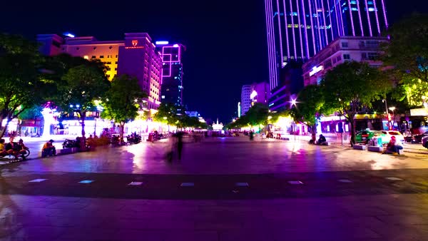 A night timelapse of the neon street at the downtown wide shot - 4K ...