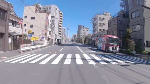 A pov of driving cityscape on the city street in Tokyo in summer wide ...