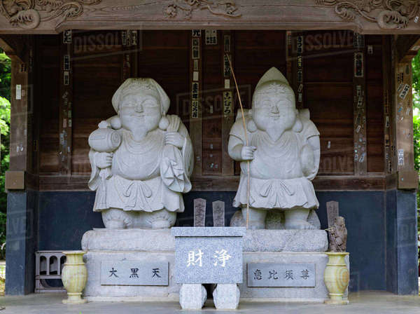 Japanese guardian statues at the traditional street in Tokyo - Stock ...