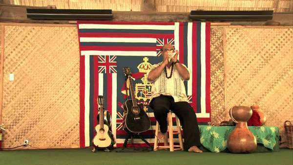 Samoan man blowing a conch shell horn long at the Polynesian Cultural ...
