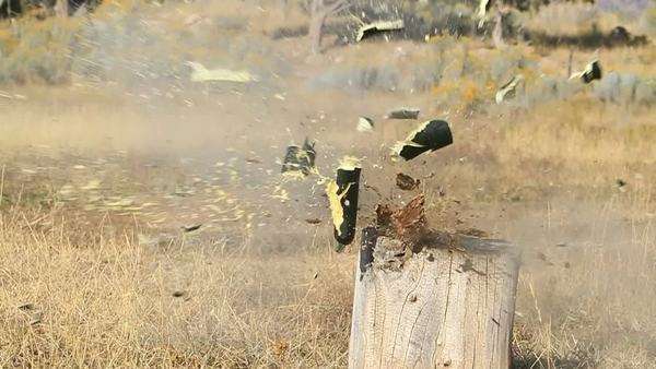 Rifle gun shoots bullet into fresh zucchini squash and explodes it into ...