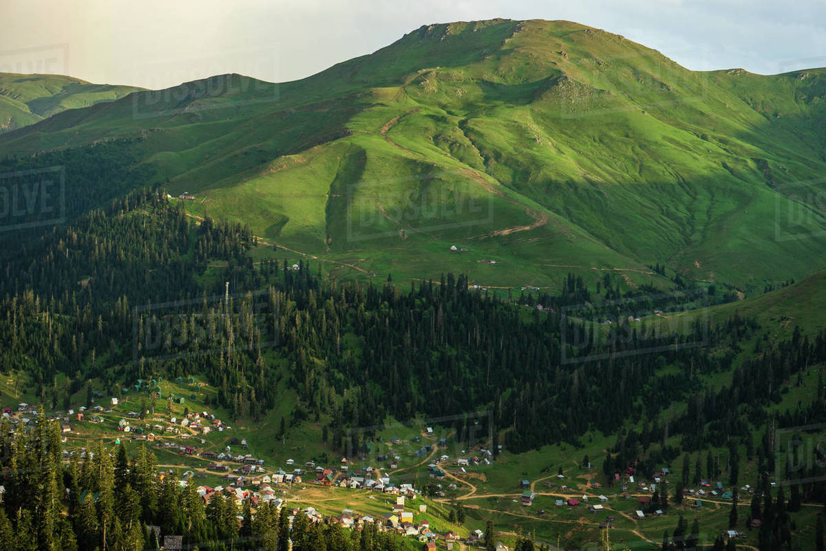 Aerial view of traditional village houses in mountains, Bakhmaro ...