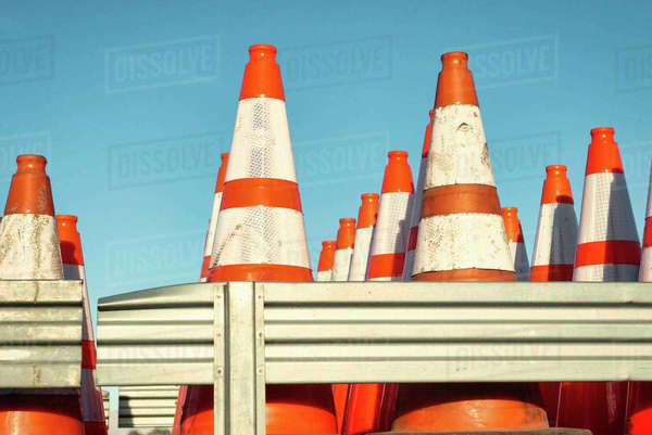 Close-up of rows of Construction Cones on at the back of a truck ...