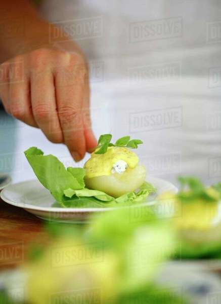 Preparing Poached Pear starter - Royalty-free Stock Photo | Dissolve