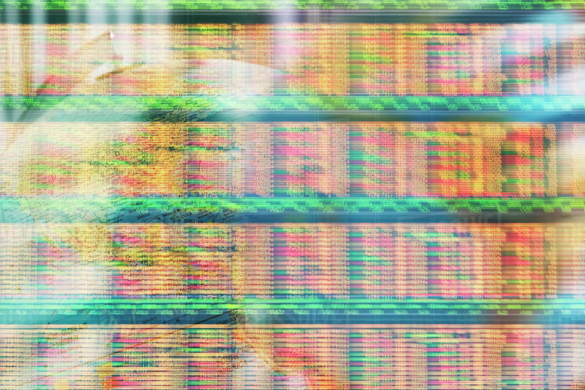 Ticker tape stock market financial data moving quickly on screen ...