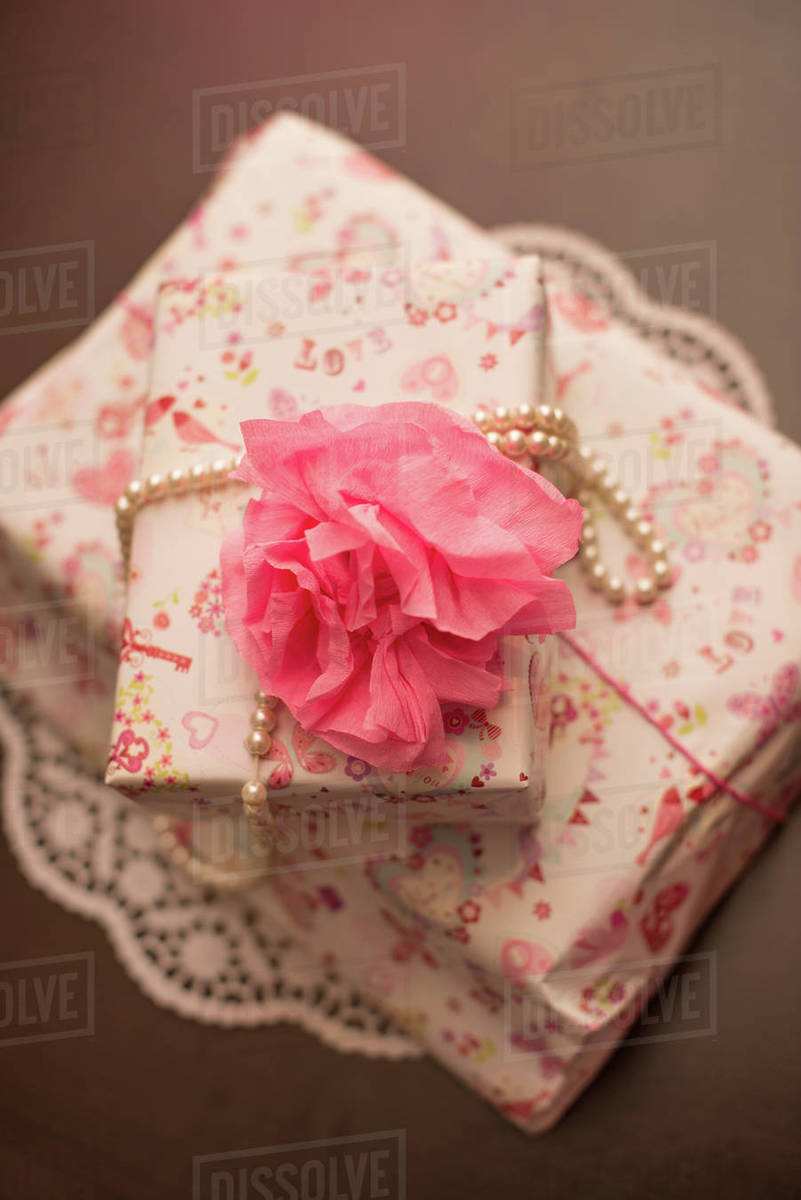 Overhead view of two pink wrapped gifts - Royalty-free Stock Photo ...