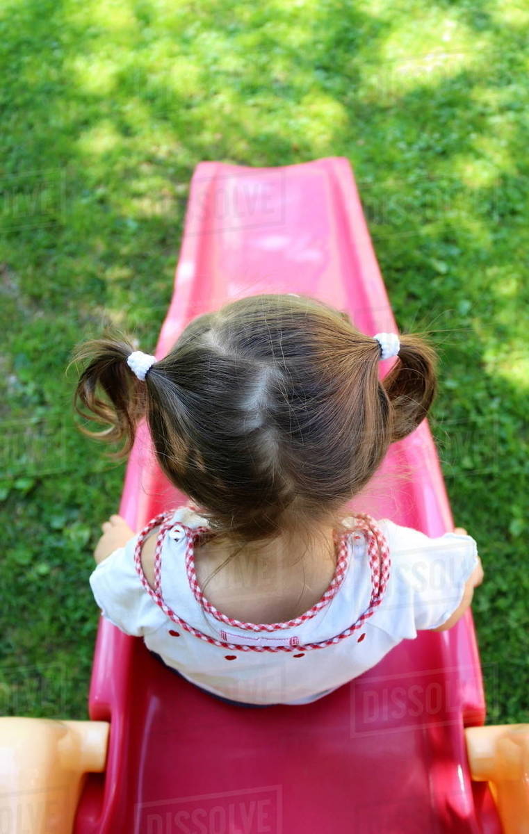 Girl on a slide - Royalty-free Stock Photo | Dissolve
