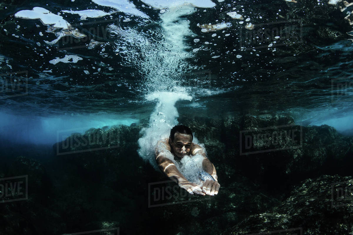 Man diving into ocean, Kalapana, West Puna, Hawaii, America, USA ...