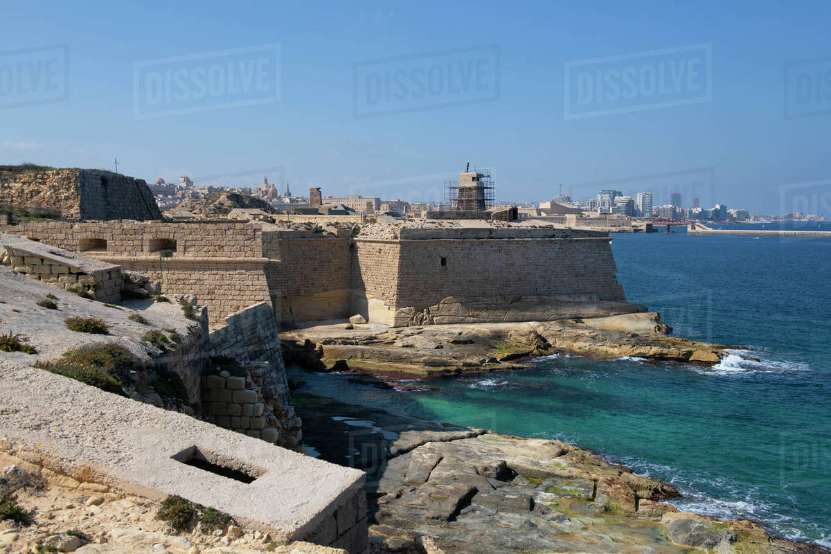View of Maltese coastline from Fort Ricasoli, Kalkara, Valletta, Malta ...