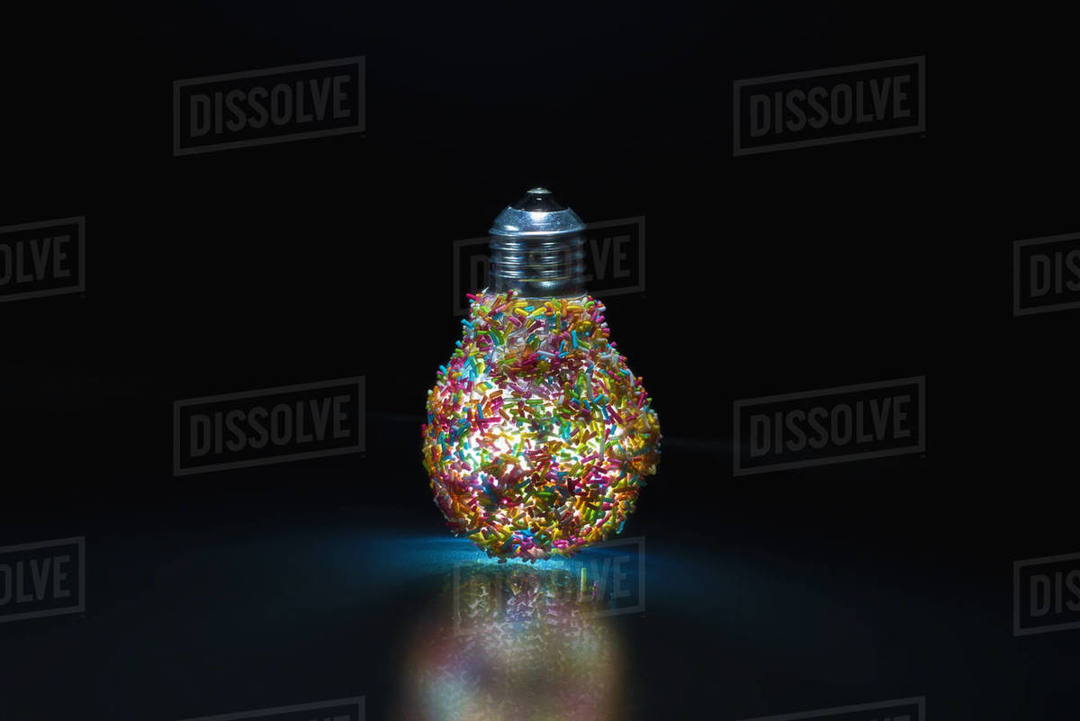 Light bulb covered in multicoloured sprinkles - Royalty-free Stock ...