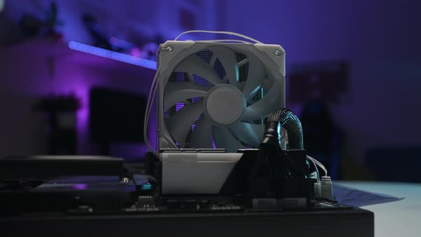 Close-up front view of cooling fan of powerful gaming CPU installed on ...