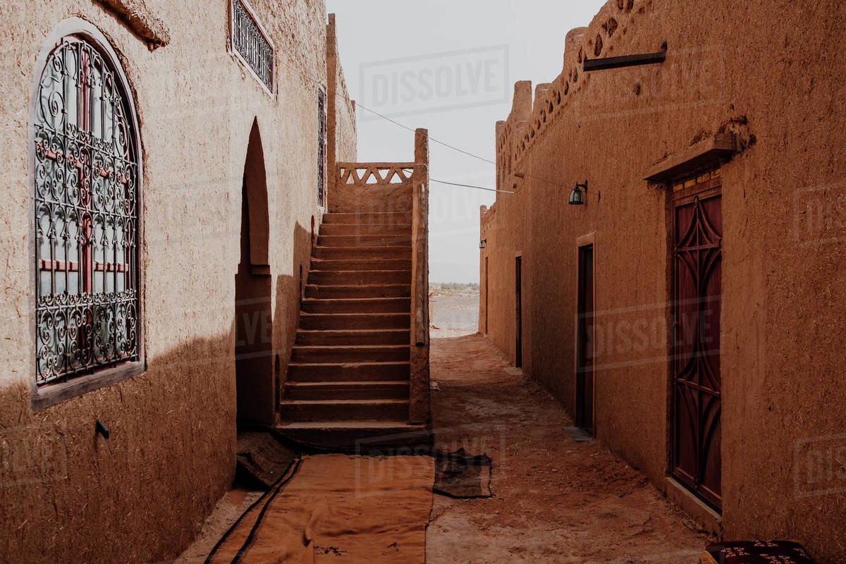 Exterior of old traditional Arab houses with staircase and ornamental ...