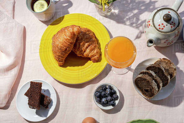 From above top view of homemade full brunch breakfast in sunlight with ...