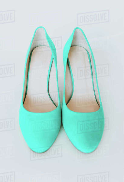 Concept of beautiful azure new woman high heel shoes on white ...