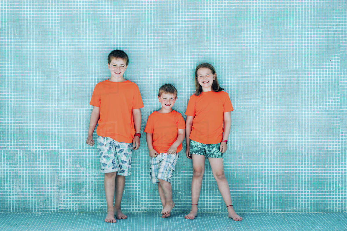 Children standing in empty pool and looking at camera - Royalty-free ...