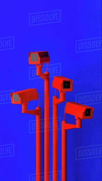 Red surveillance camera on blue background monitoring people on the ...