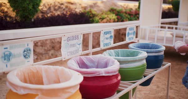 Girl Throws Drops Plastic bags Garbage into Colored Trash Sorting ...