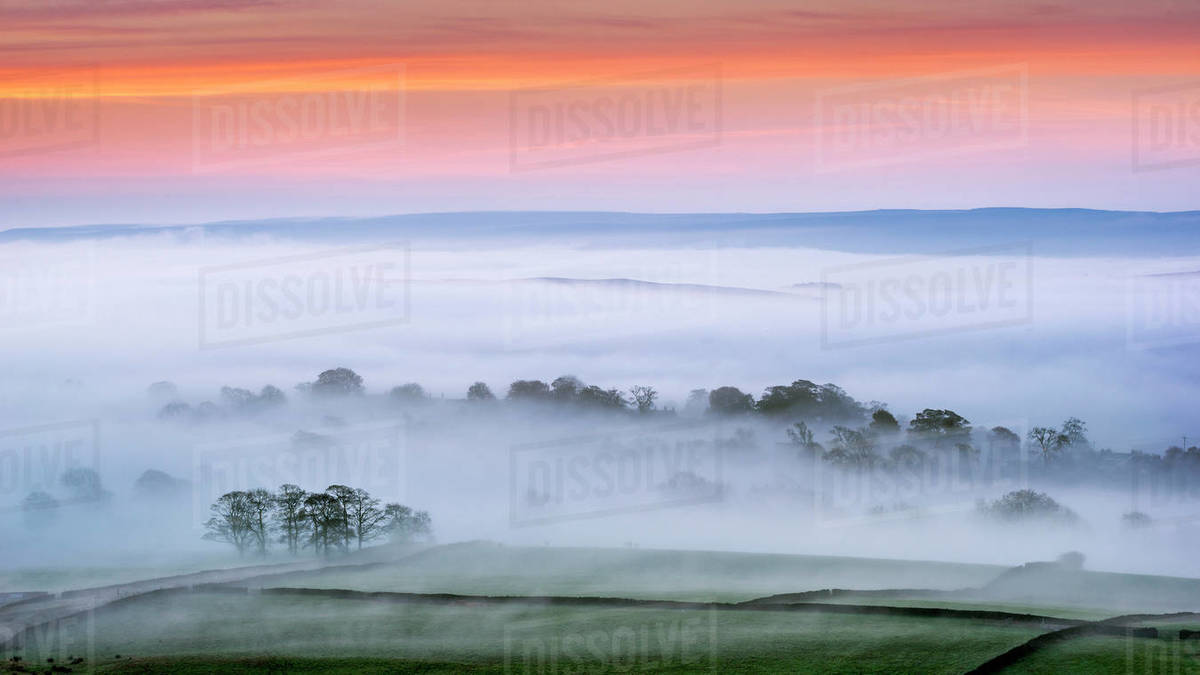 Mist rising over East Halton and Embsay at sunrise, in Lower Wharfedale ...