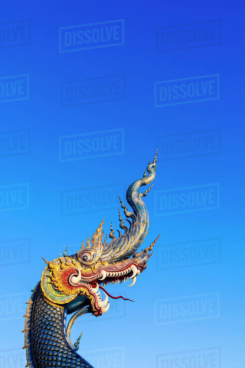 Naga head at Wat Rong Suea Ten (Blue Temple) in Chiang Rai, Thailand ...