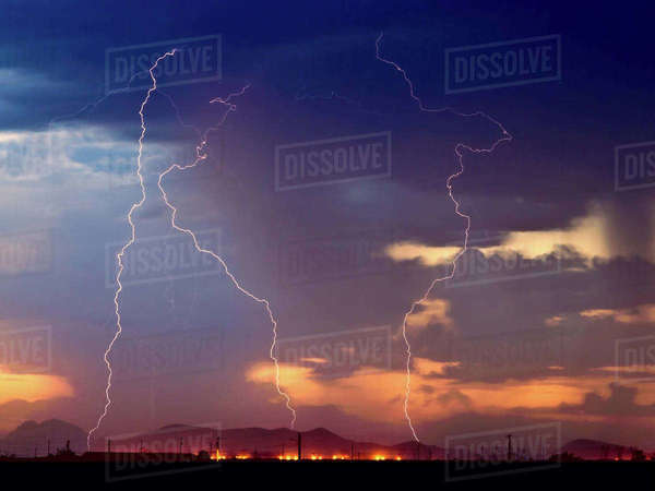 Three bolts of lightning striking near the Palo Verde Nuclear Station ...