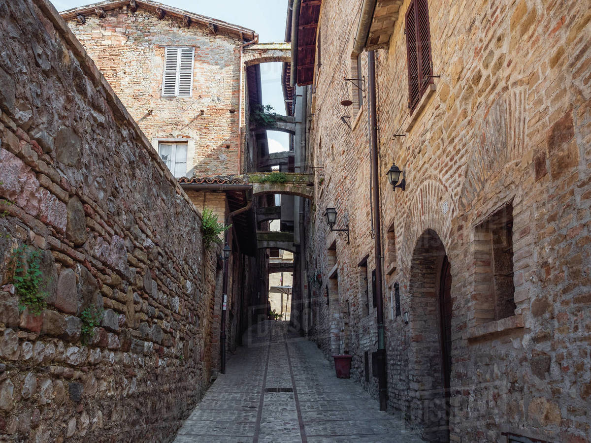 A typical street full of arches in Montefalco's old town, Montefalco ...