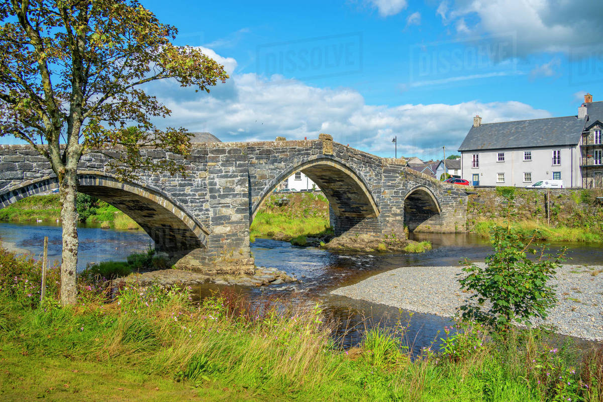 View of Pont Fawr (Inigo Jones Bridge) over Conwy River and riverside ...