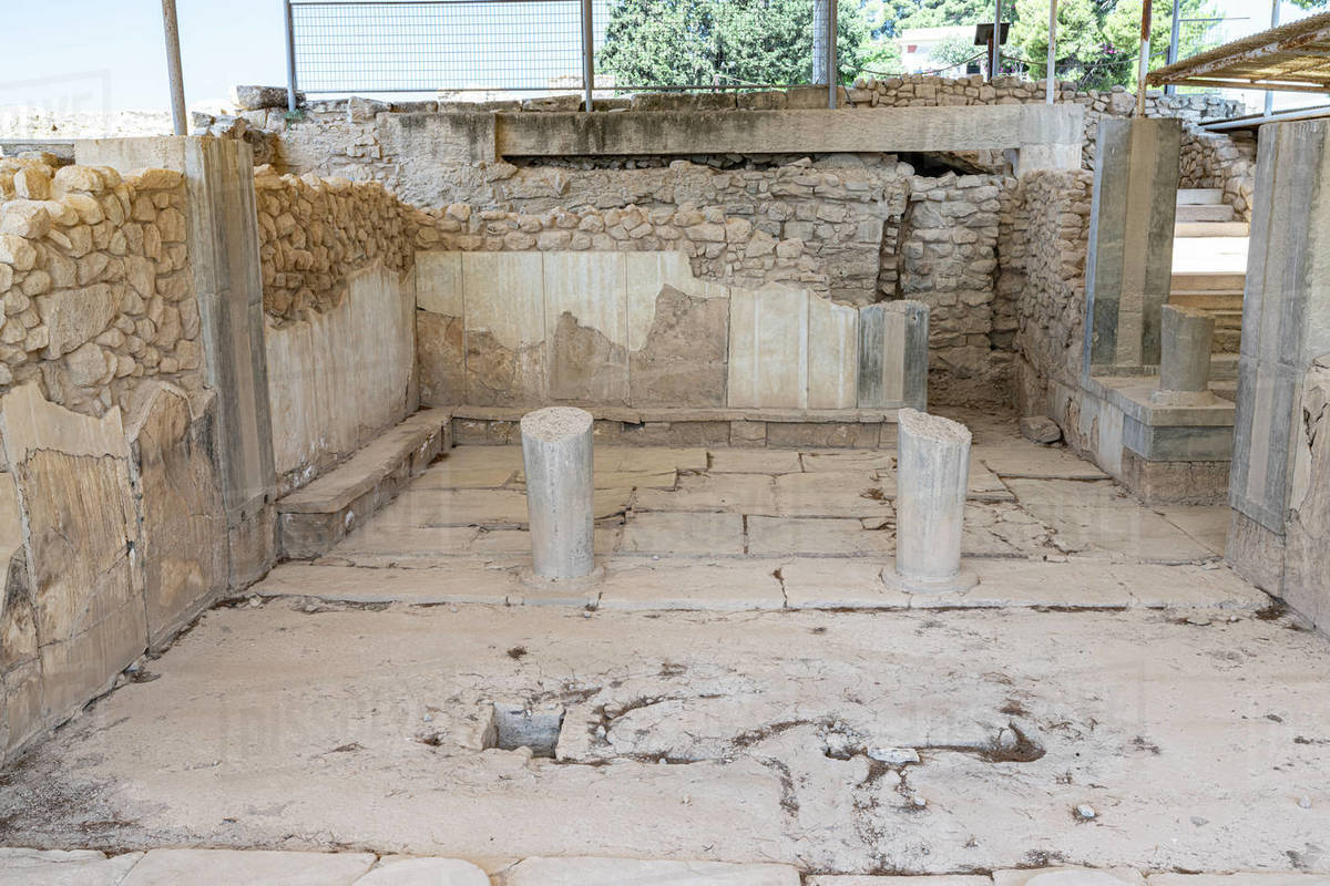 Ancient stone flooring and columns in the royal apartment of Phaistos ...