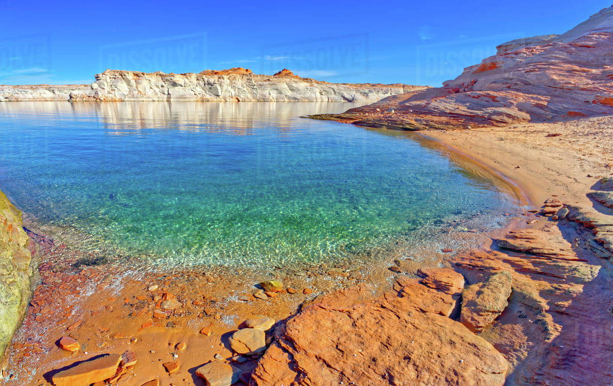 A small lagoon in Lake Powell where boats can drop anchor and come ...