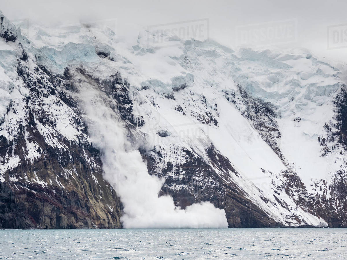 An avalanche of falling ice on Thule Island, a volcanic island in the ...
