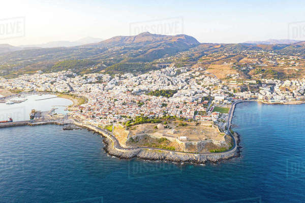 Aerial view of old Venetian harbor and Fortezza, citadel of the seaside ...