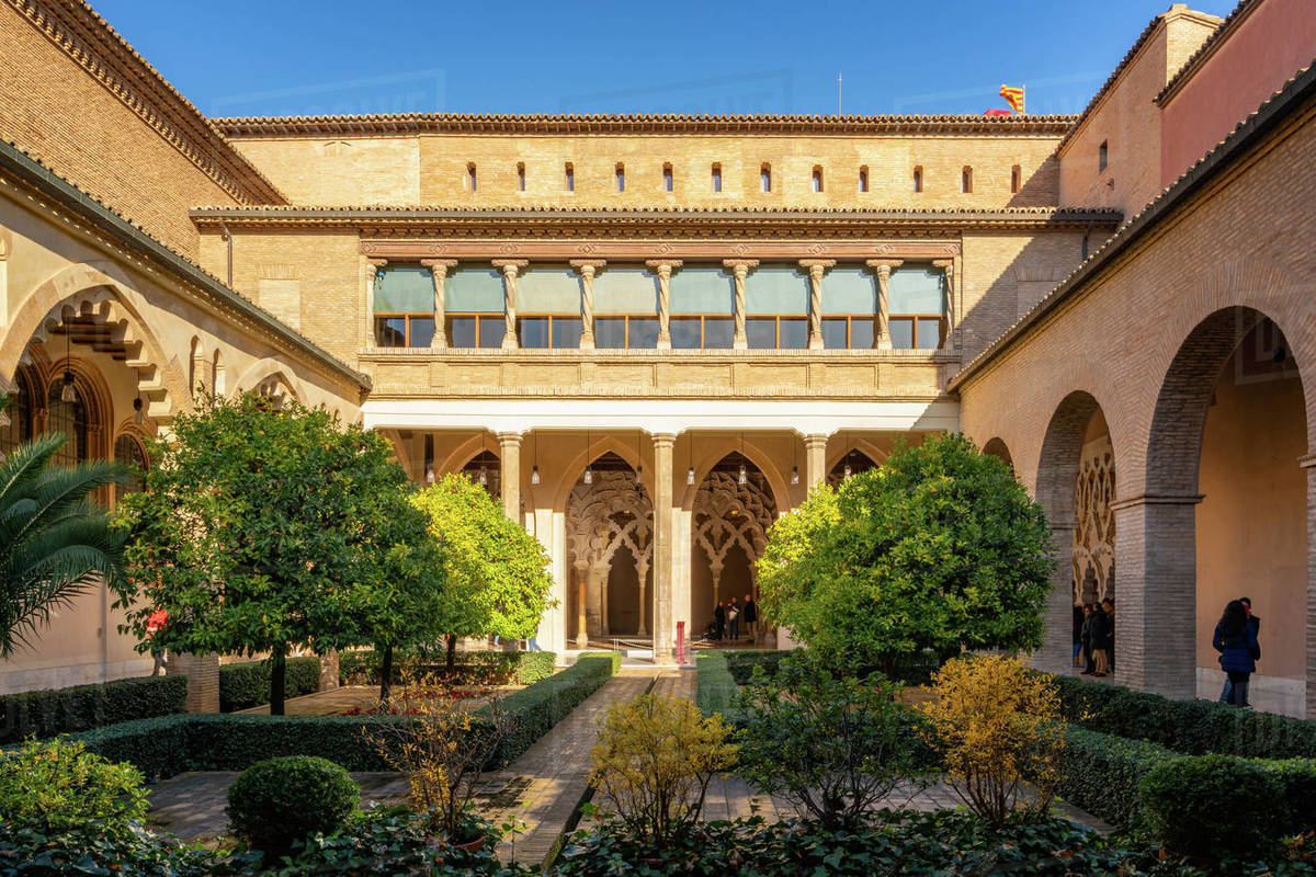 Aljaferia fortified medieval Islamic palace interior details and garden ...