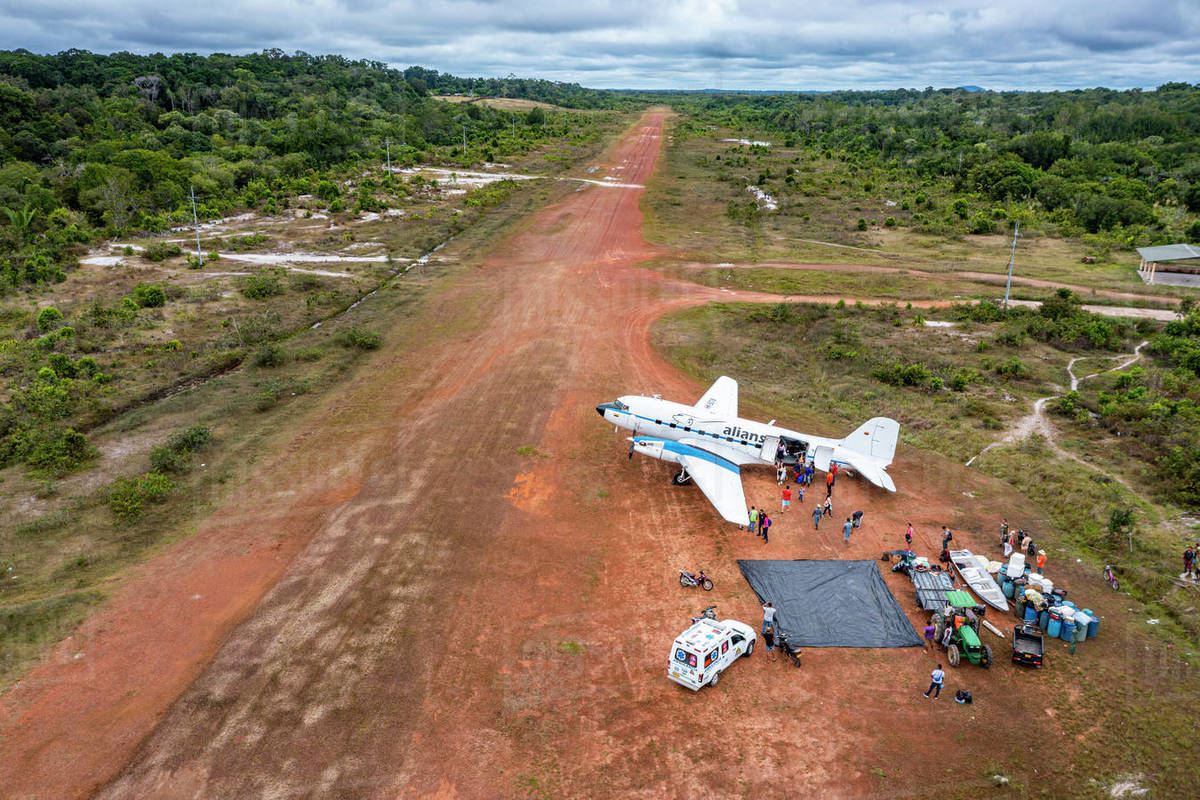 Aerial of a DC3 aircraft on a landing strip, San Felipe, Colombia ...