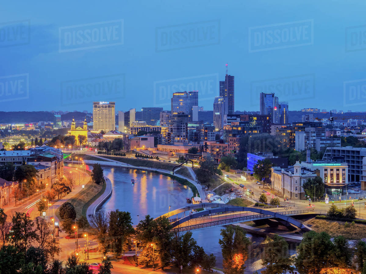 View over Neris River towards Snipiskes, New City Centre, dusk, Vilnius ...