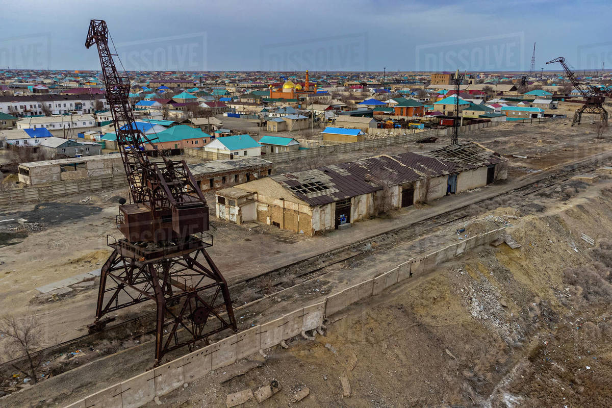 Aerial of the Aral Lake and Aralsk, with its rusty cranes, Aral lake ...