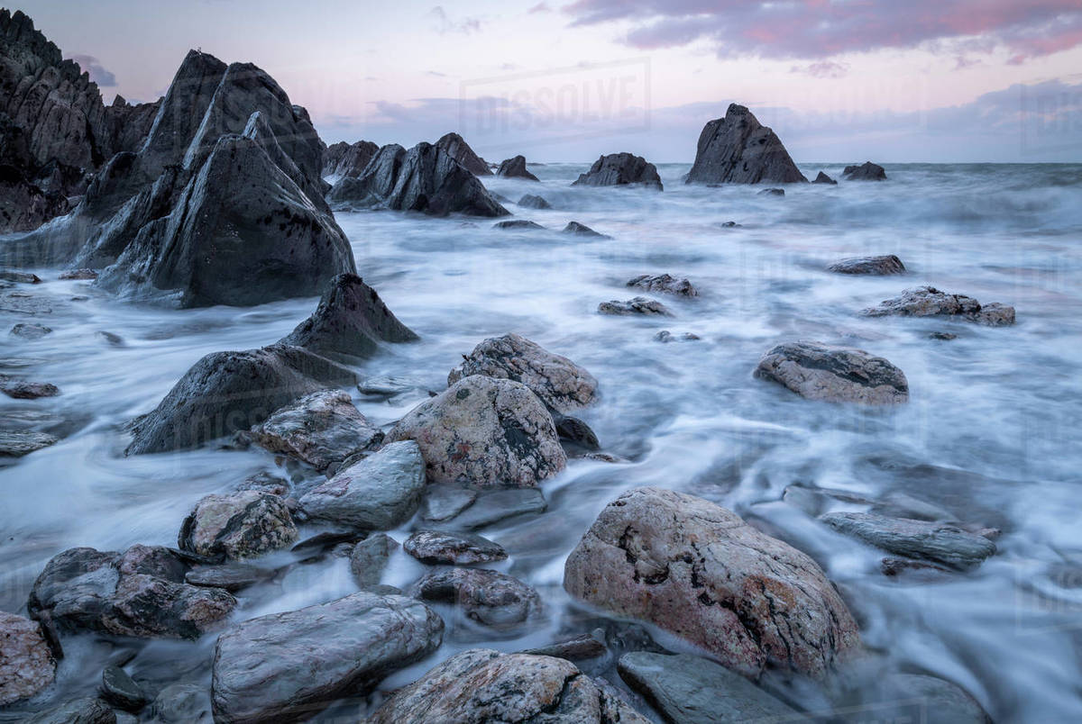 Dawn over the rugged coast of North Devon in winter, Devon, England ...