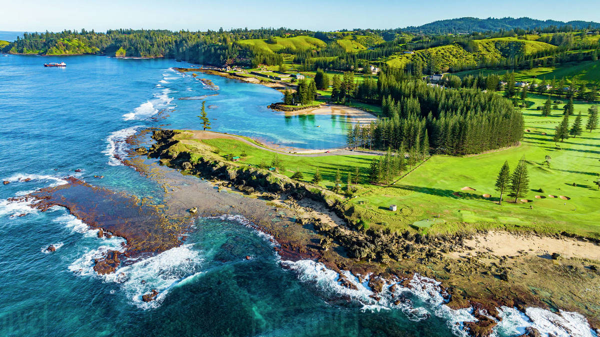 Aerial of Emily Bay, UNESCO World Heritage Site, Norfolk island ...