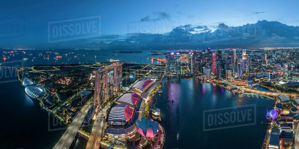 Aerial view of Marina Bay Sands and Singapore City Harbour at night, Singapore, Southeast Asia ...