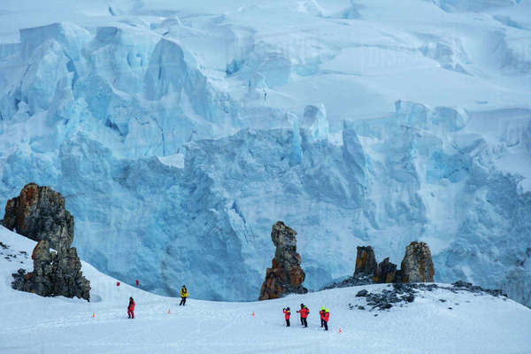 Hikers climbing Half Moon Island, South Shetland Islands, Antarctica ...