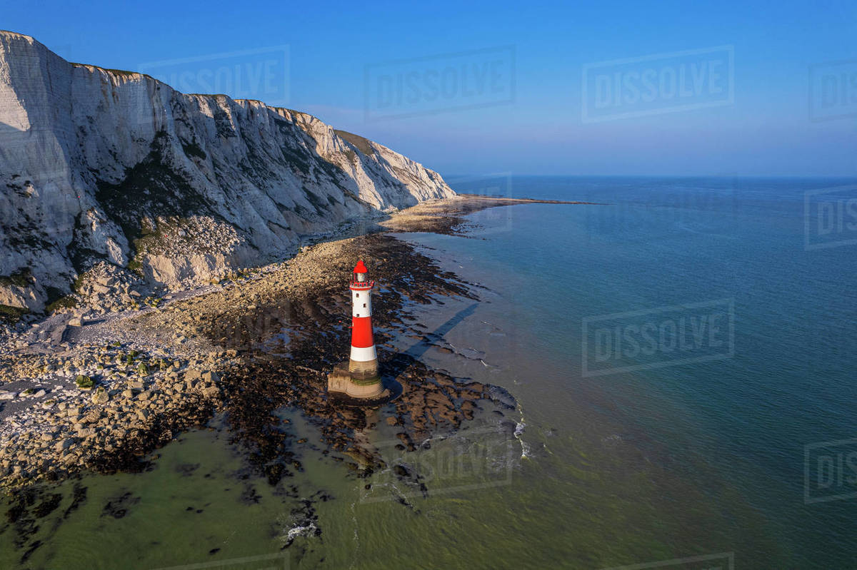 Aerial view of the Beachy Head Lighthouse at low tide, Seven Sisters ...