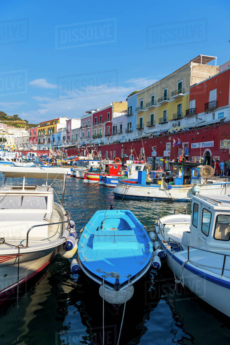 Small boats in the port of the colourful fishing village of Ponza ...